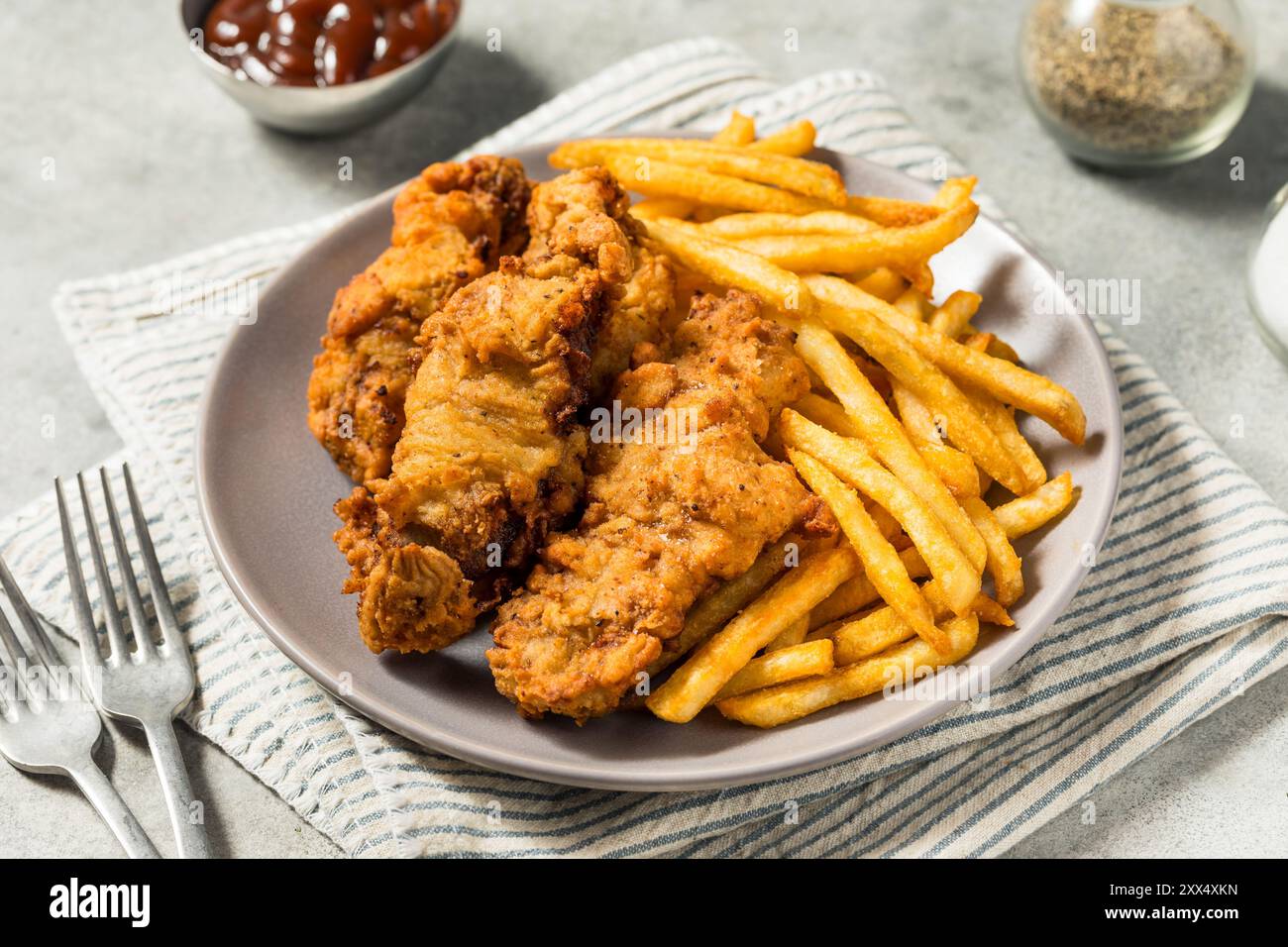 Homemade Fried Idaho Finger Steaks with French Fries Stock Photo - Alamy