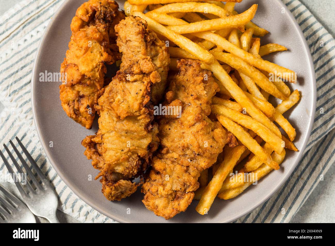 Homemade Fried Idaho Finger Steaks with French Fries Stock Photo - Alamy