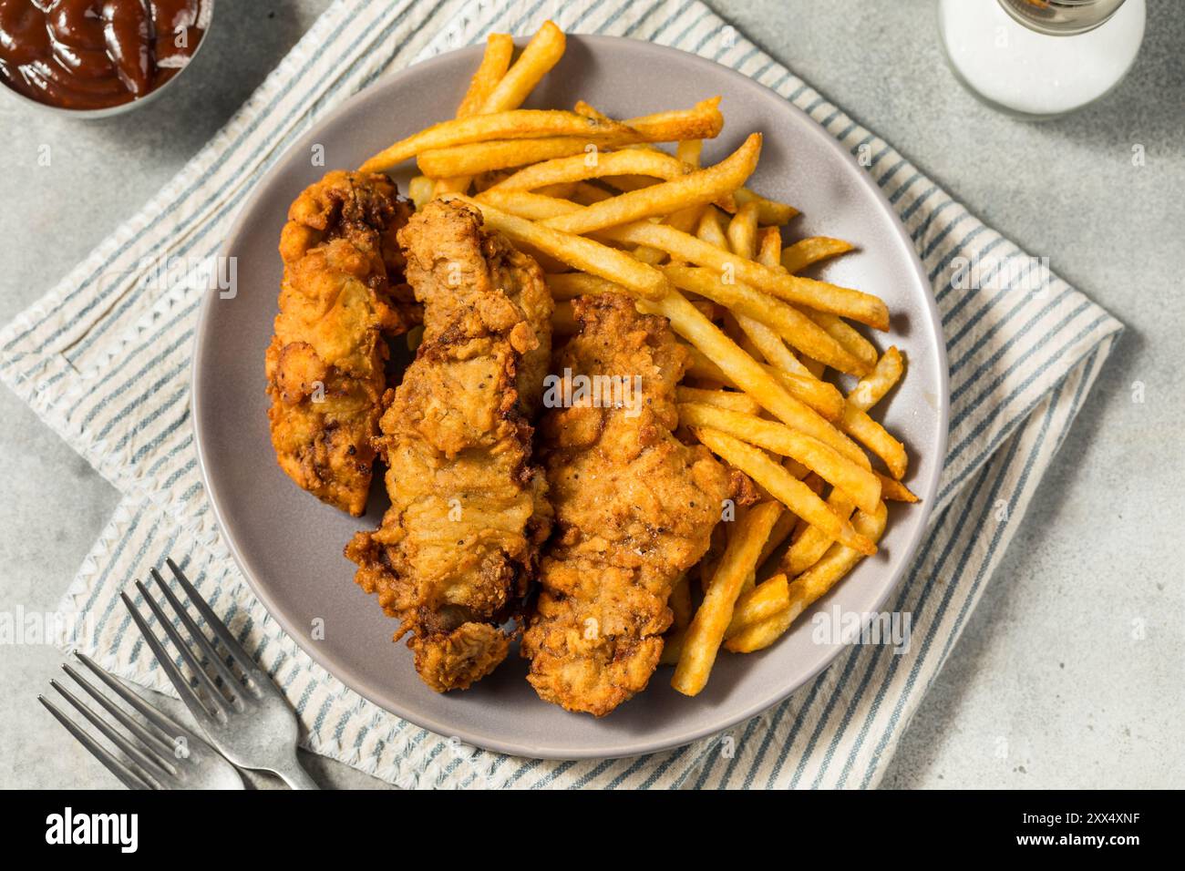 Homemade Fried Idaho Finger Steaks with French Fries Stock Photo - Alamy