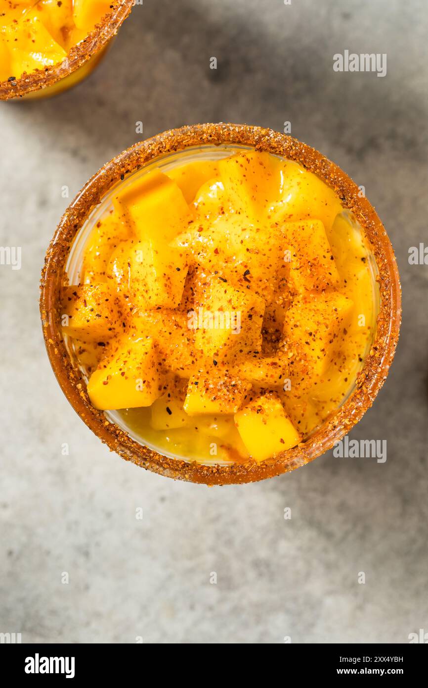 Healthy Frozen Mango Mangonada Cocktail Drink with Chamoy Spice Stock ...