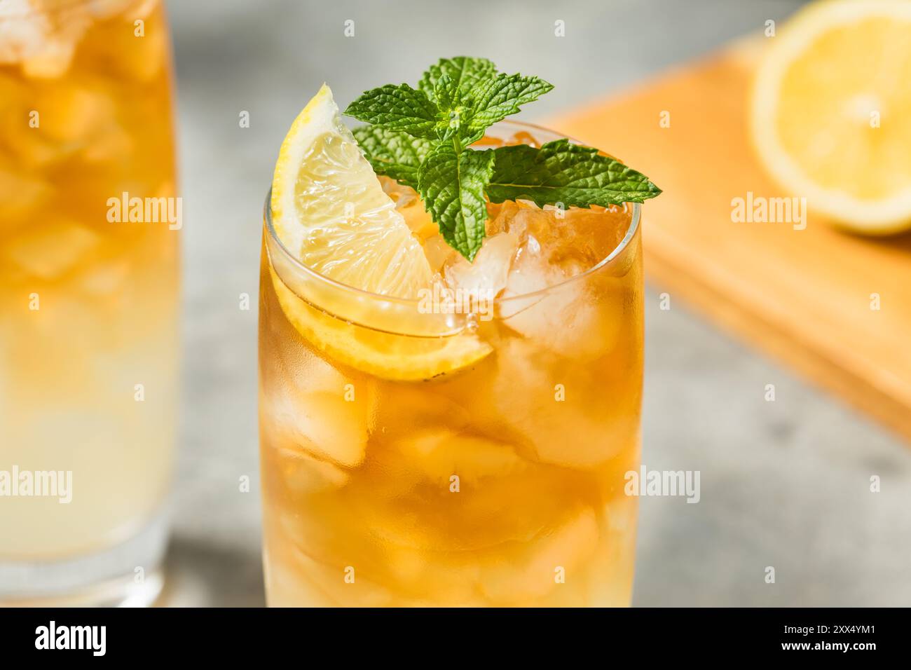 Cold Refreshing Iced Tea and Lemonade Drink with Lemon and Mint Stock ...