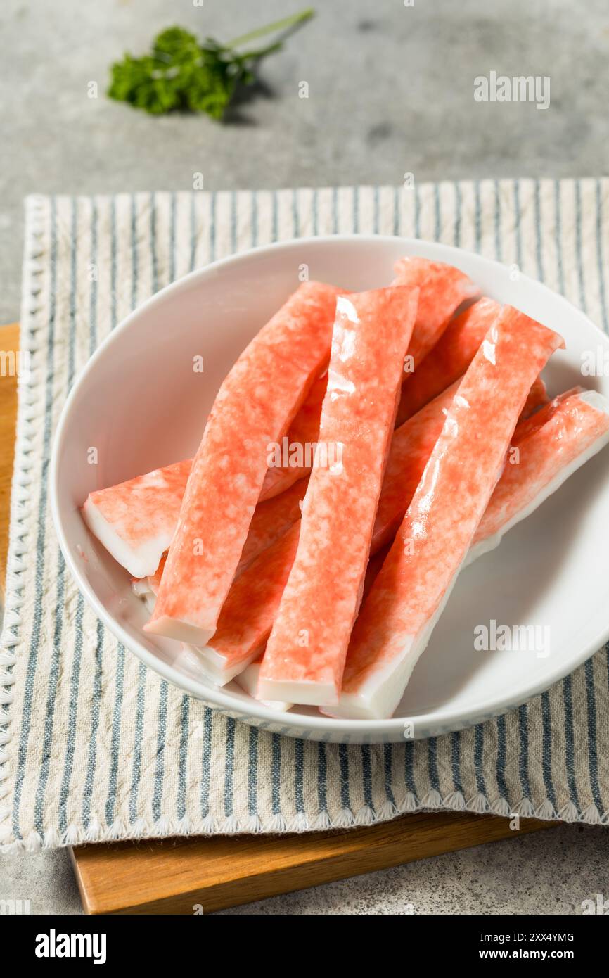 Organic Raw Imitation Crab Meat Sticks Ready to Eat Stock Photo - Alamy