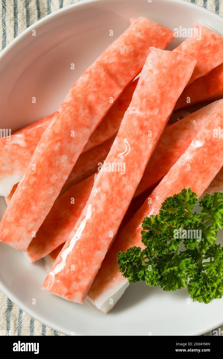 Organic Raw Imitation Crab Meat Sticks Ready to Eat Stock Photo - Alamy