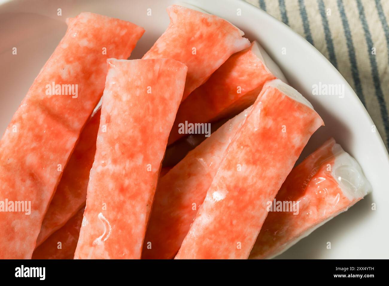 Organic Raw Imitation Crab Meat Sticks Ready to Eat Stock Photo - Alamy