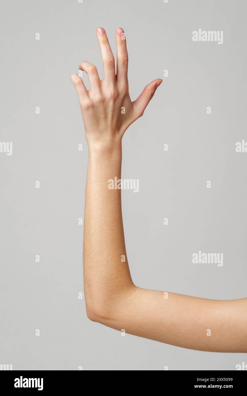Human arm extended upward hi-res stock photography and images - Alamy