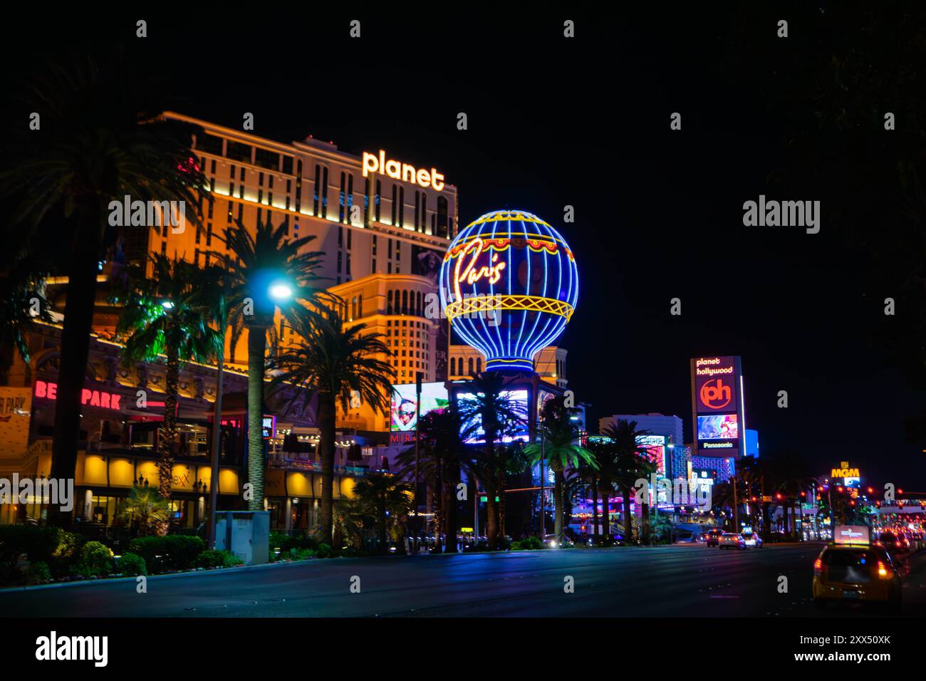 The colorful night photo of Las Vegas Strip with Paris Las Vegas hotel ...