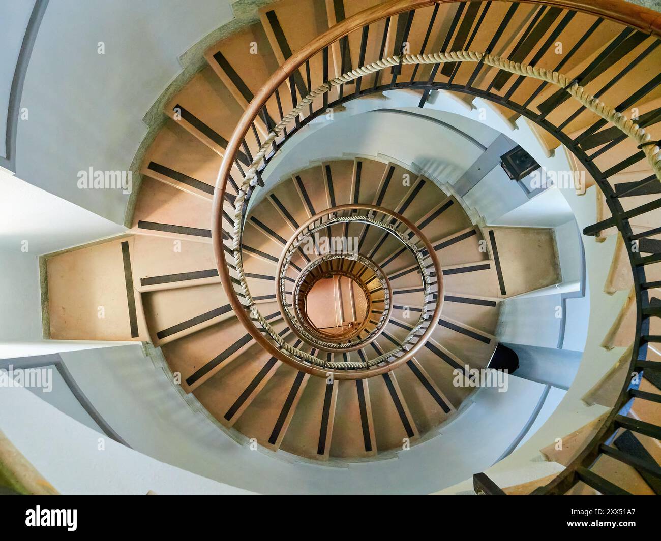 The spiral staircase in the lighthouse of La Garoupe on Cap d'Antibes on the French Riviera ...
