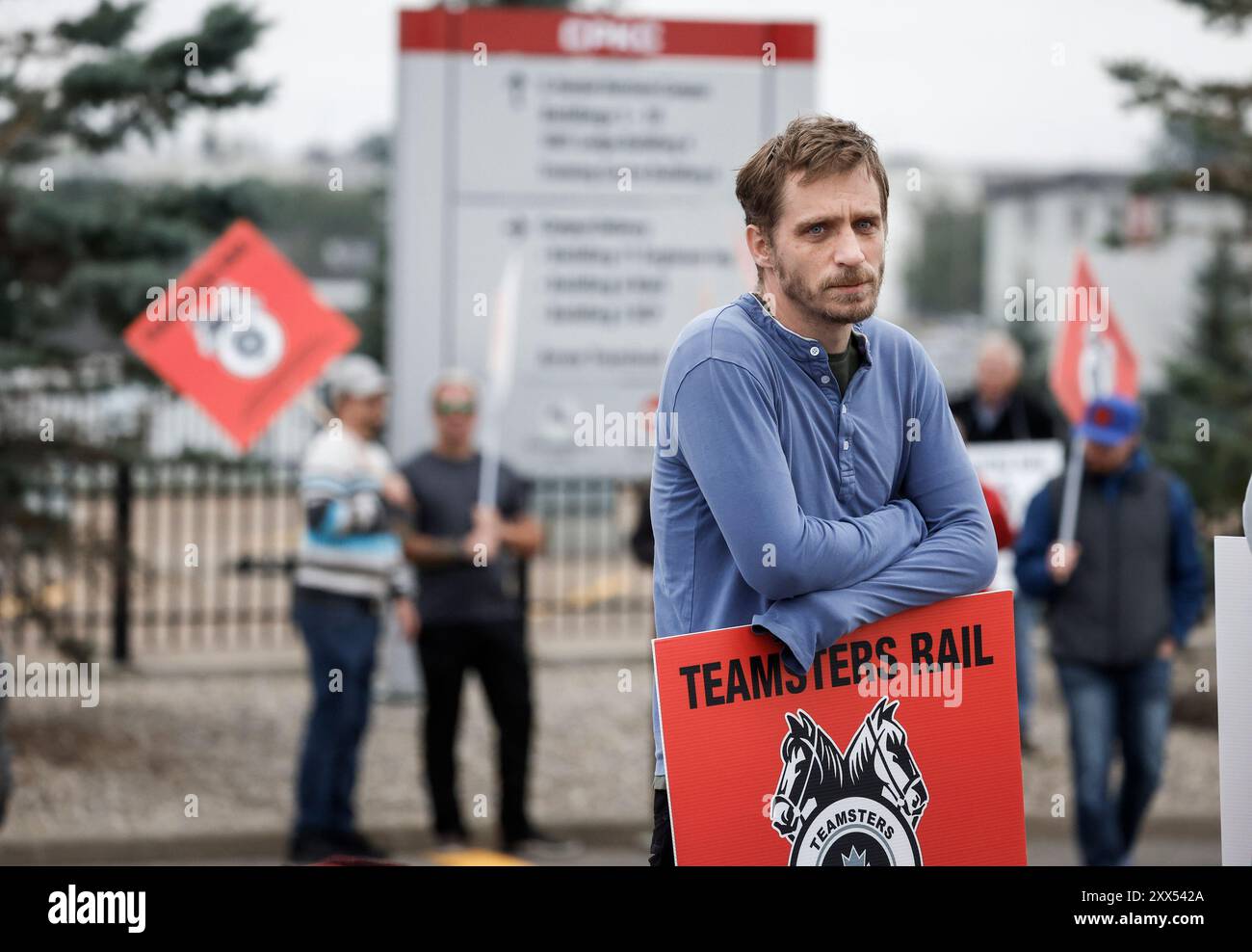 Teamsters Canada Rail Conference members walk a picket line at the CPKC ...