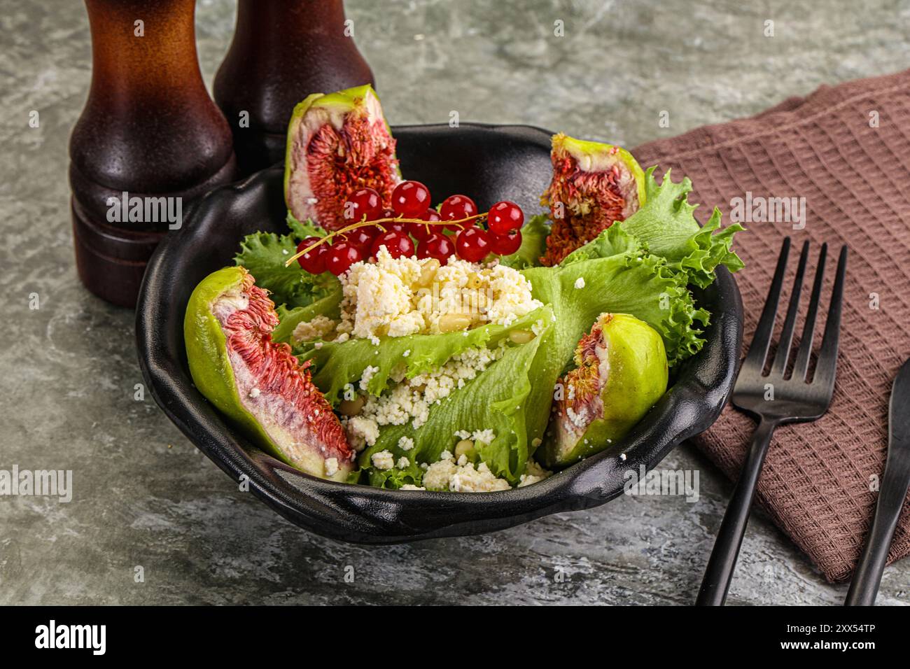 Salad with fig and sheep cottage cheese Stock Photo - Alamy