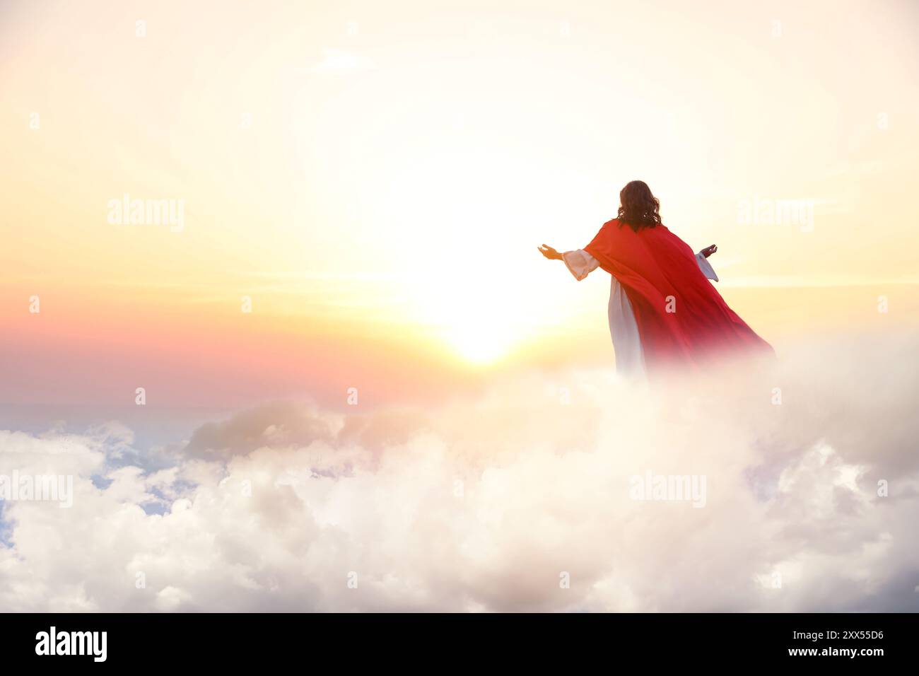 Jesus Christ in sunlight among clouds in sky Stock Photo - Alamy