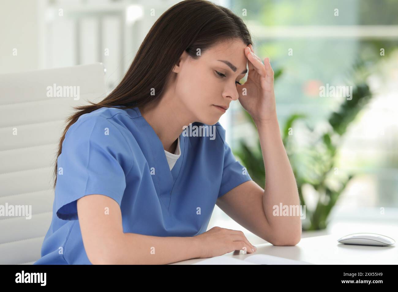 Stressed care home nurse hi-res stock photography and images - Alamy