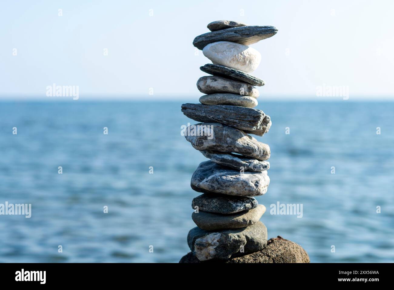 balanced stones on the rocks of the sea Stock Photo - Alamy