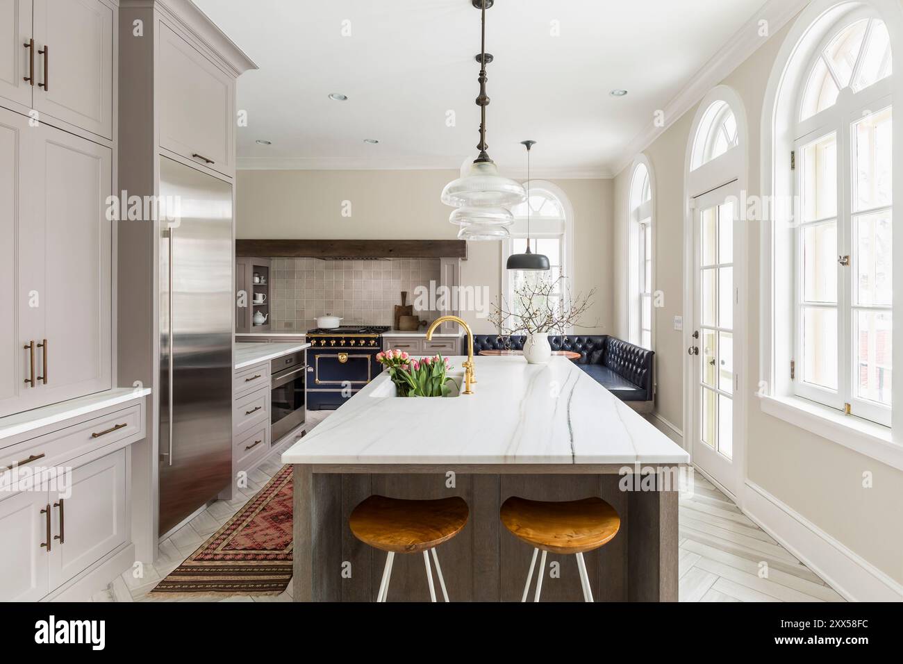Kitchen with half round top windows and French country style Stock ...