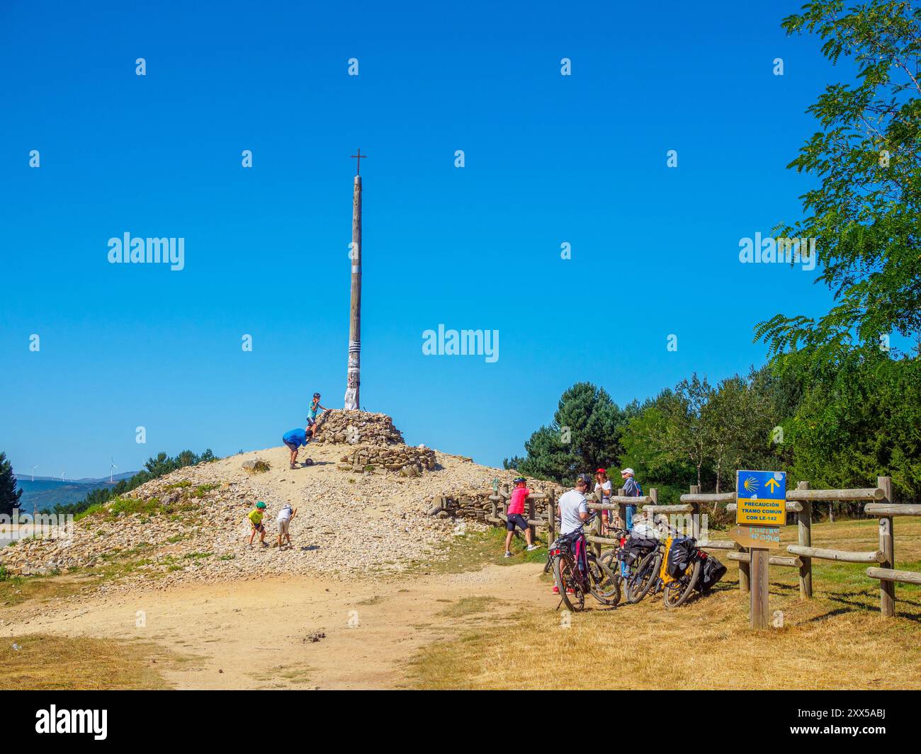 The iconic Cruz de Ferro, a significant landmark on the Camino de Santiago, near Foncebadon ...