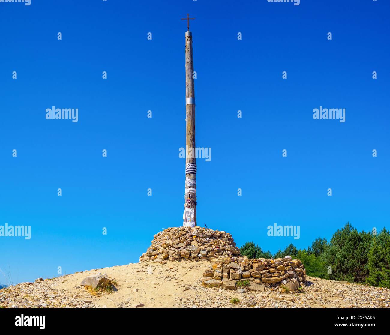The iconic Cruz de Ferro, a significant landmark on the Camino de ...