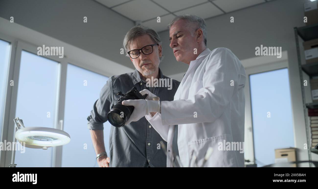 Scientists in modern archaeological lab: Senior paleoanthropologist and ...