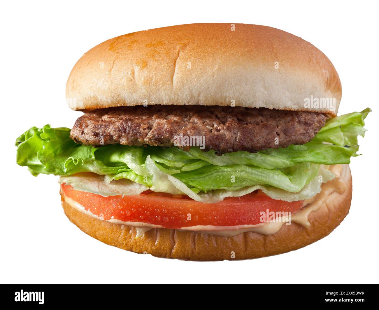 Single hamburger with lettuce, tomato, and sauce on a plain hamburger ...