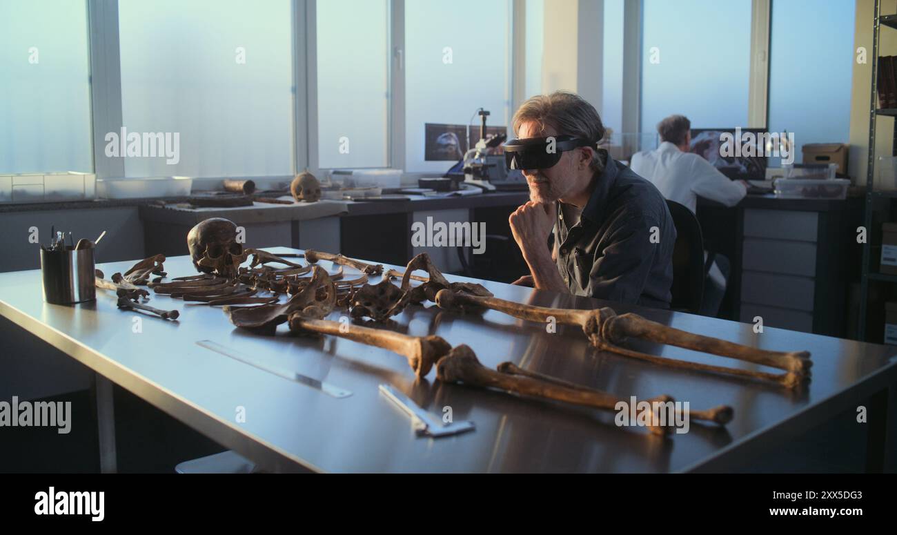Mature archaeologist in glasses hi-res stock photography and images - Alamy