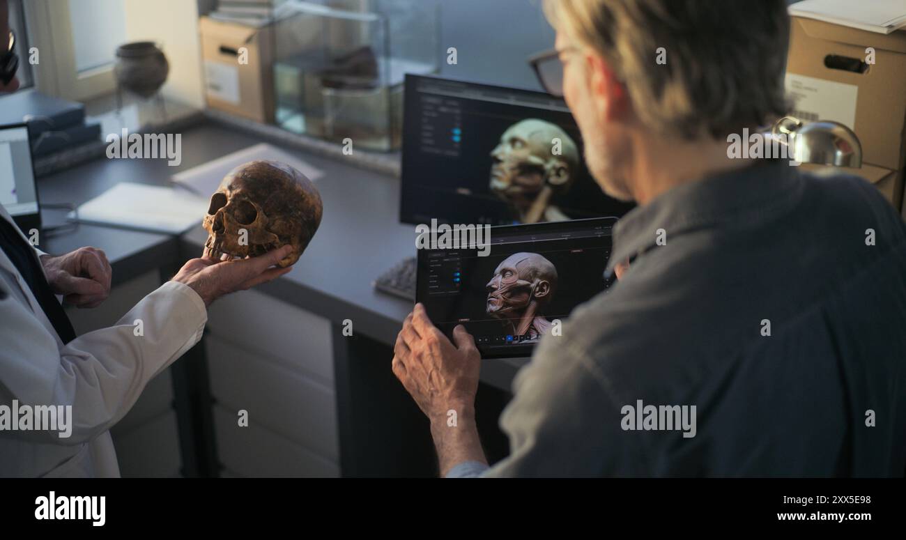 Two archaeologists study fossil skull, create 3D model of prehistoric ...