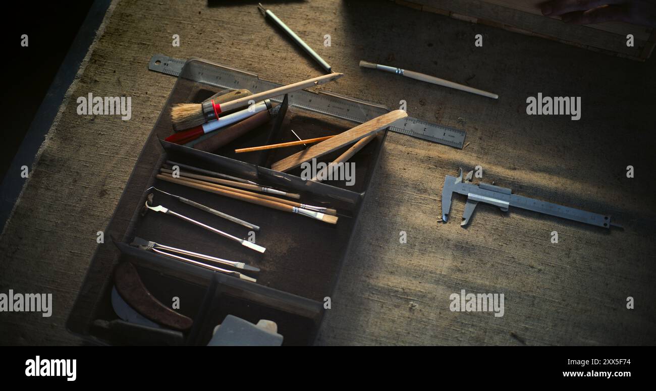 Archaeologist using magnifier hi-res stock photography and images - Alamy