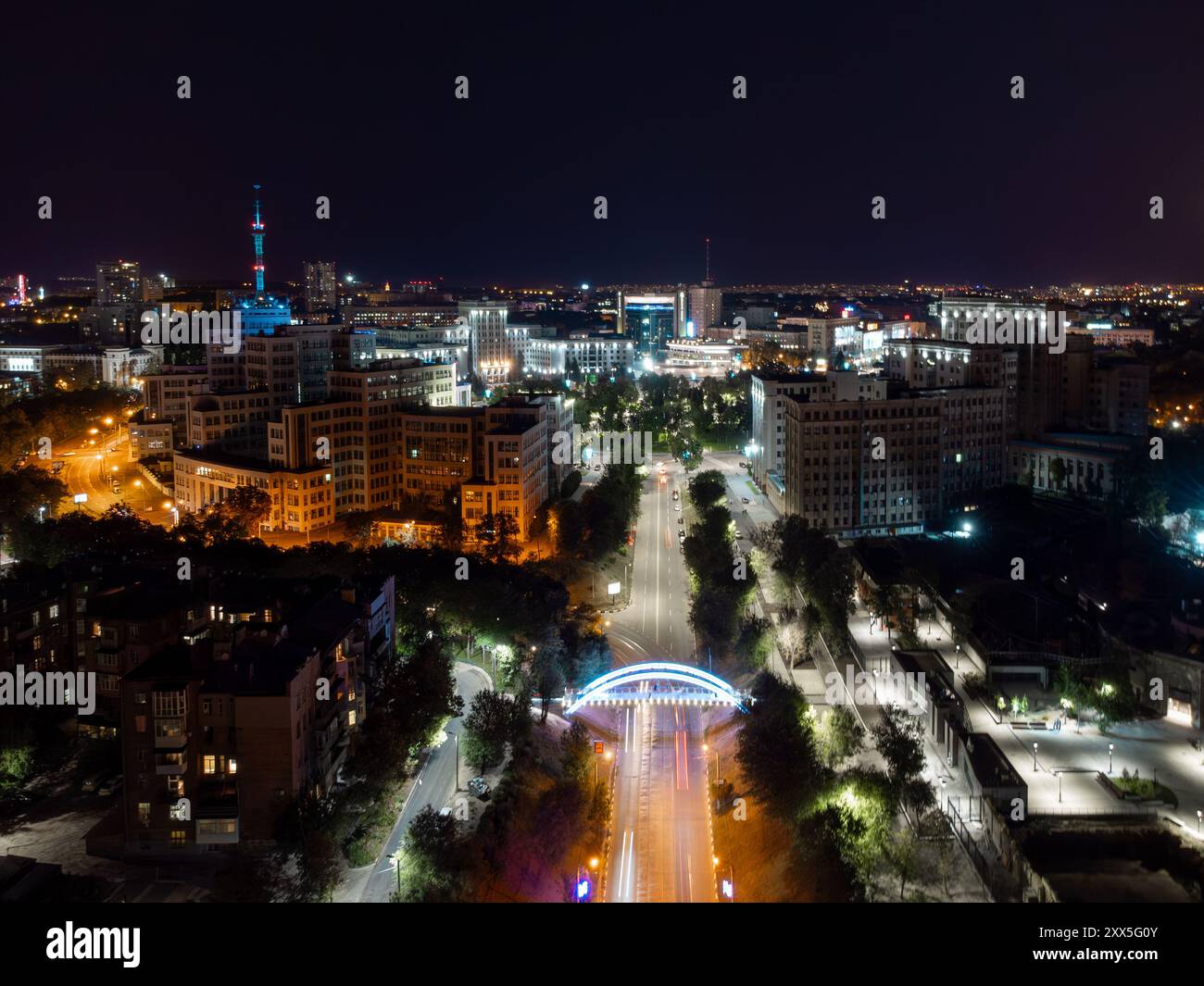 Aerial night illuminated Freedom Square panorama with Derzhprom and ...