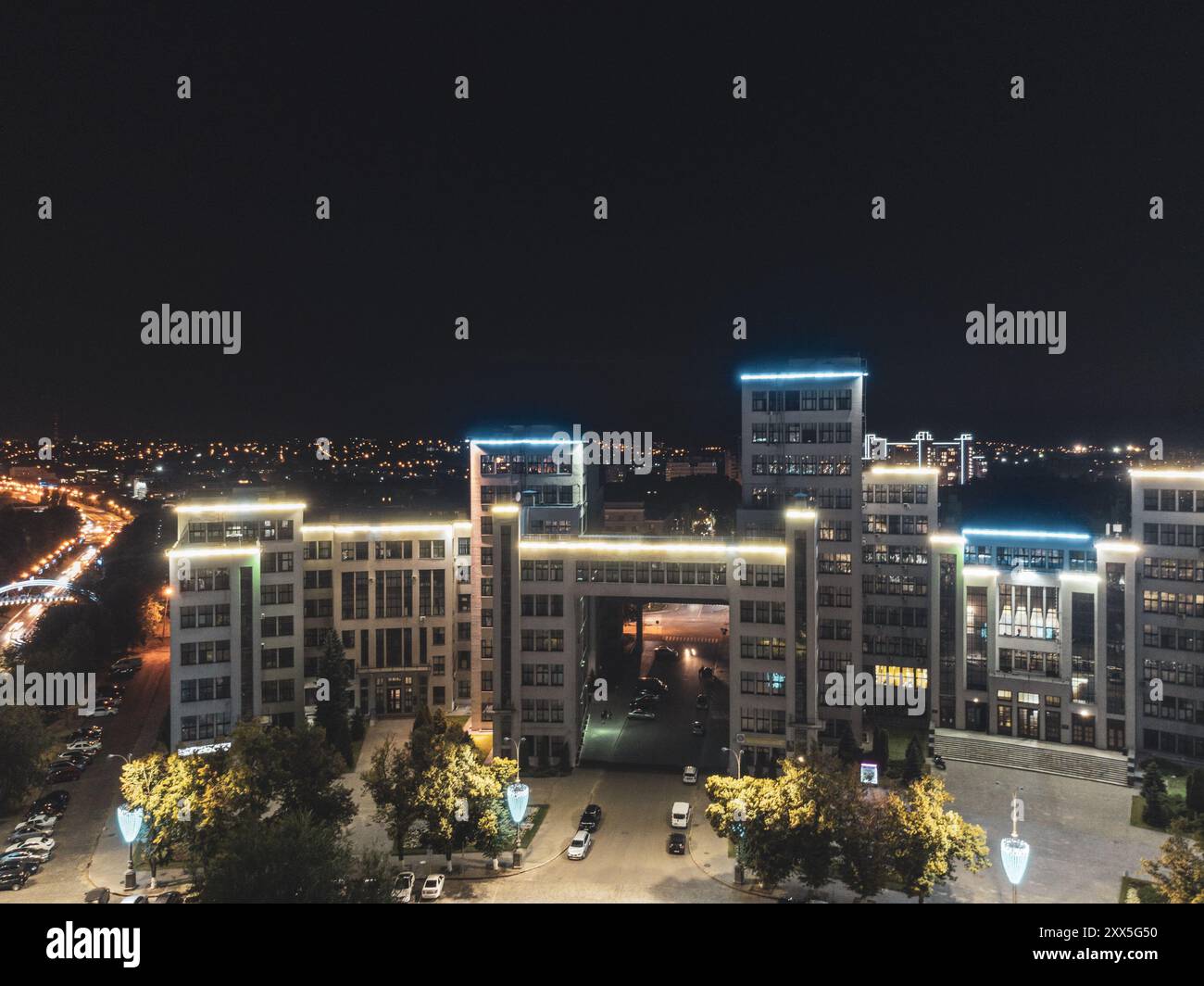 Aerial night of Derzhprom building facade with blue illumination on ...
