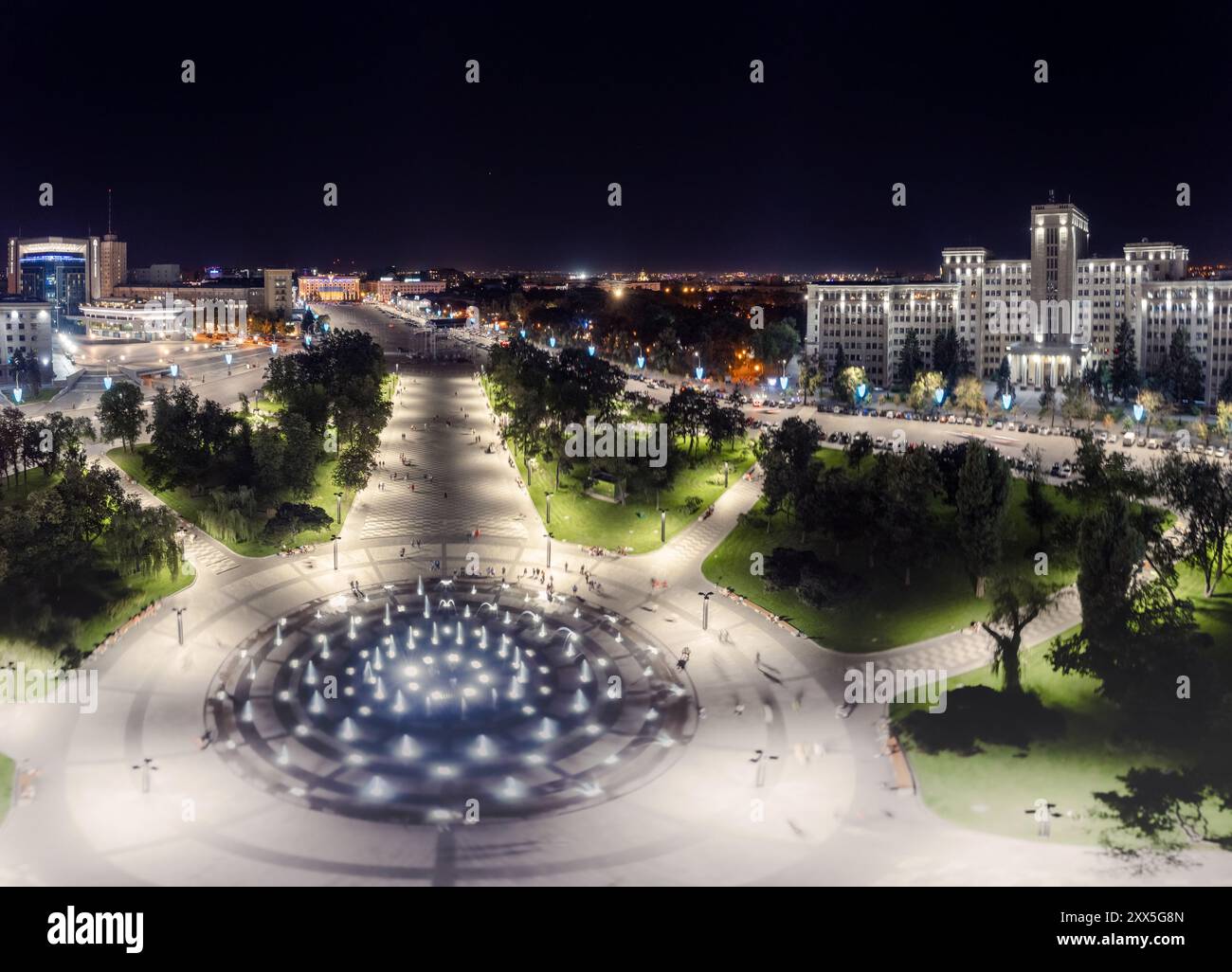 Aerial night Freedom Square wide panorama with fountain and illuminated ...
