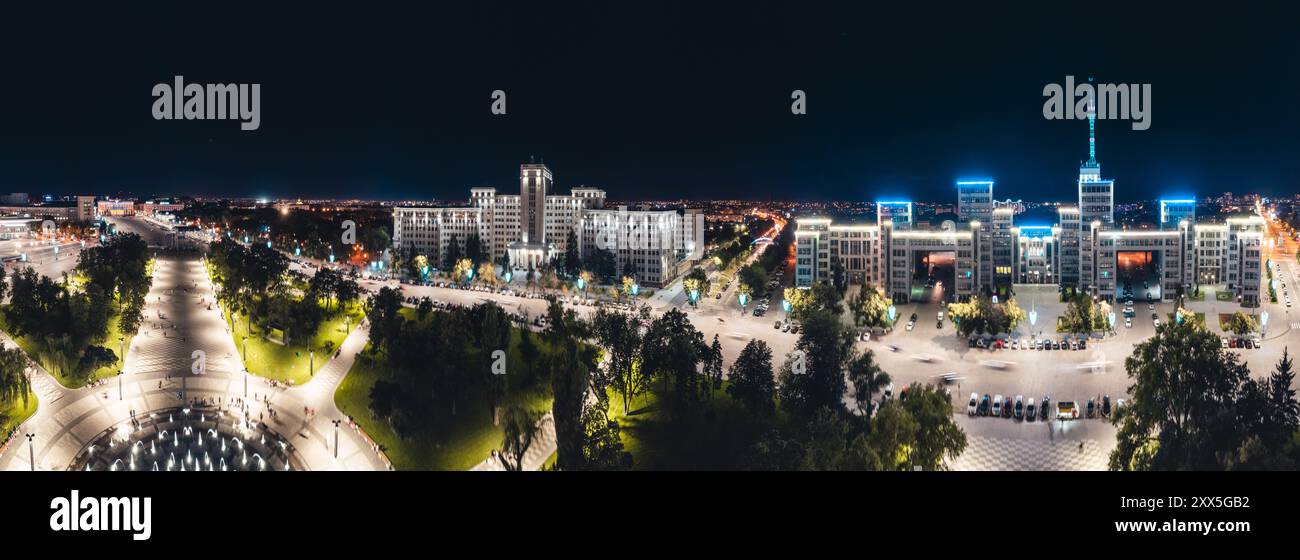 Aerial wide panorama illuminated Freedom Square with Derzhprom and ...