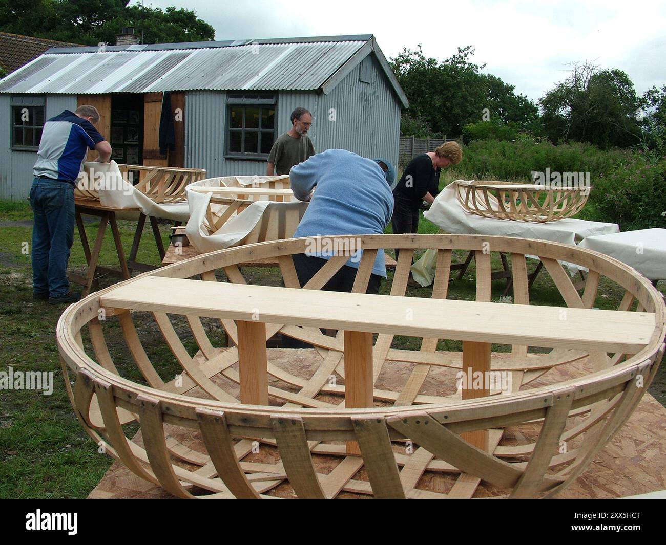 Coracle making, students in a workshop held to encourage one of the ...