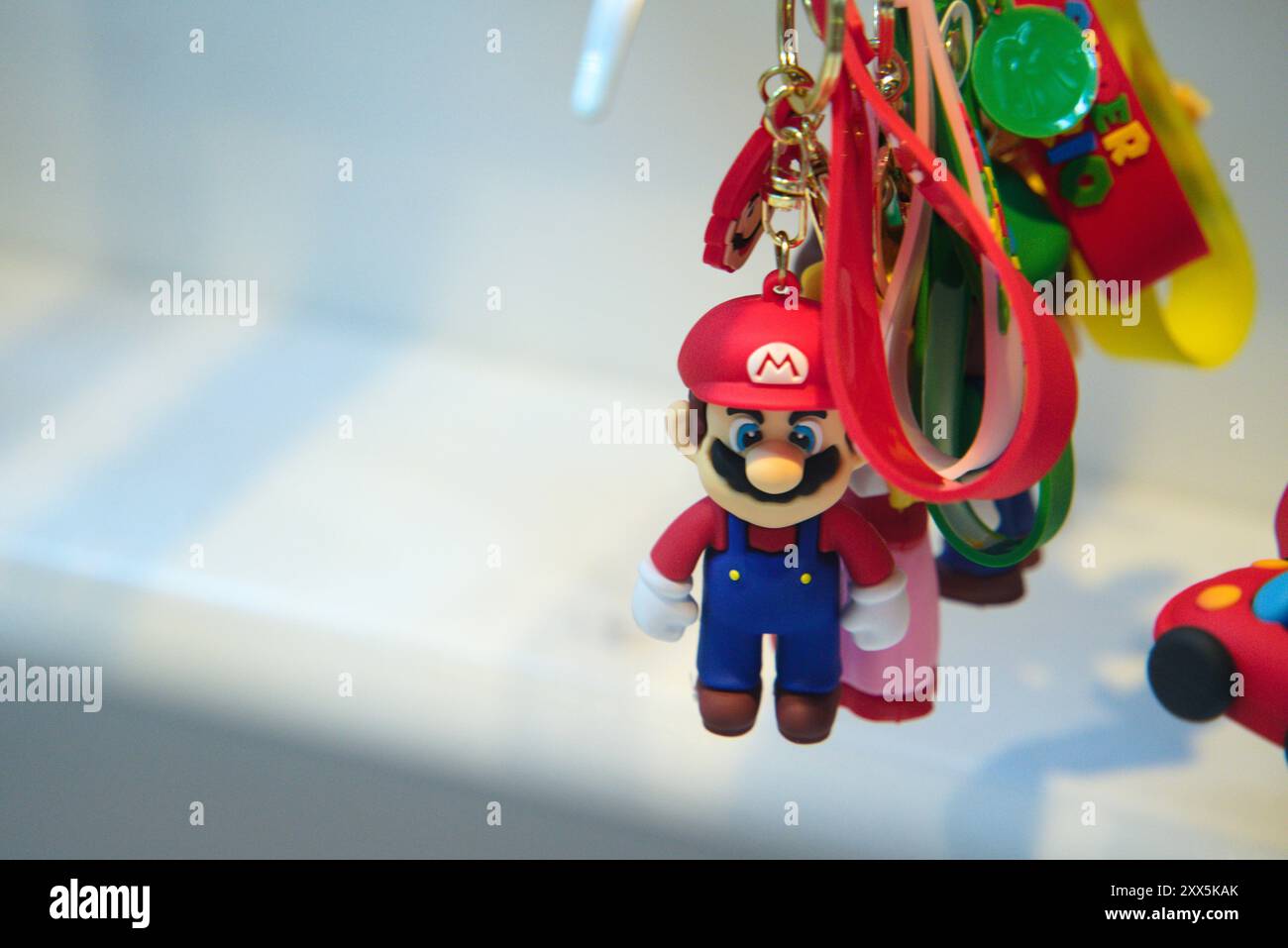 Arcade Adventure: Mario Toy Keychain Stock Photo - Alamy