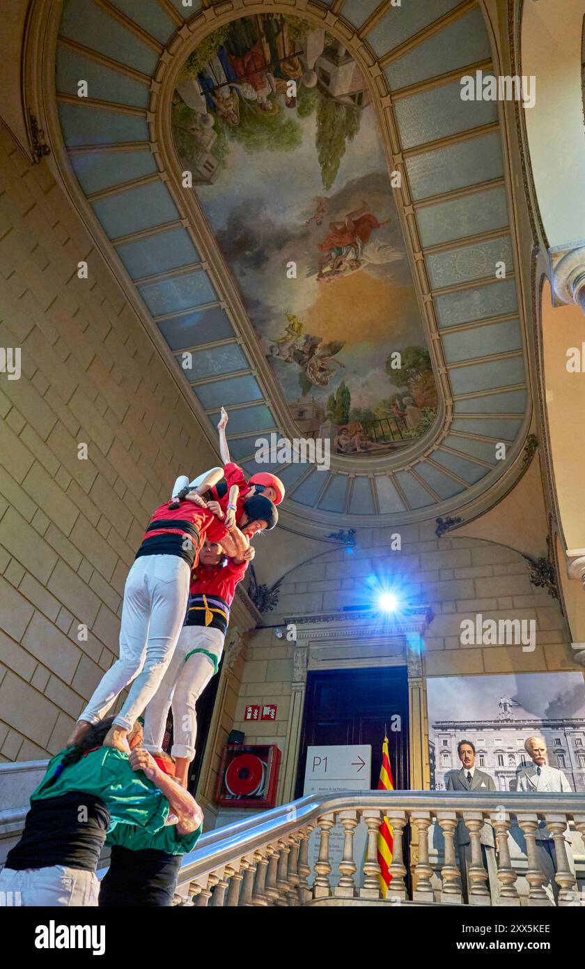 Gymnasts pyramid in the wax museum in Barcelona, Spain Stock Photo - Alamy