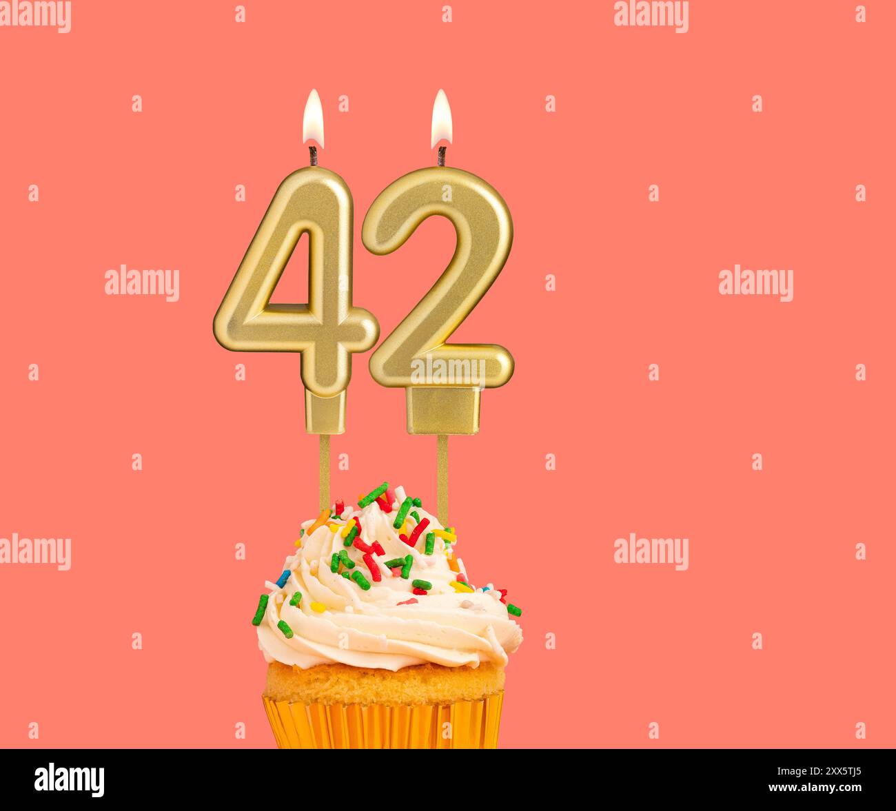 Birthday candle and cupcake - Number 42 Stock Photo - Alamy