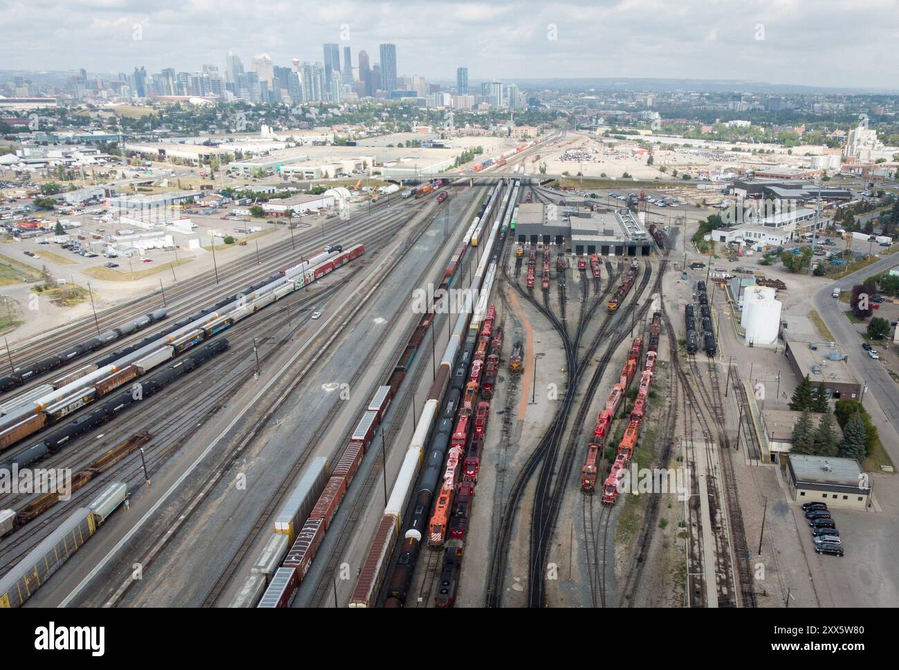Calgary, Canada. 22nd Aug, 2024. Railcars and locomotives sit idle at ...