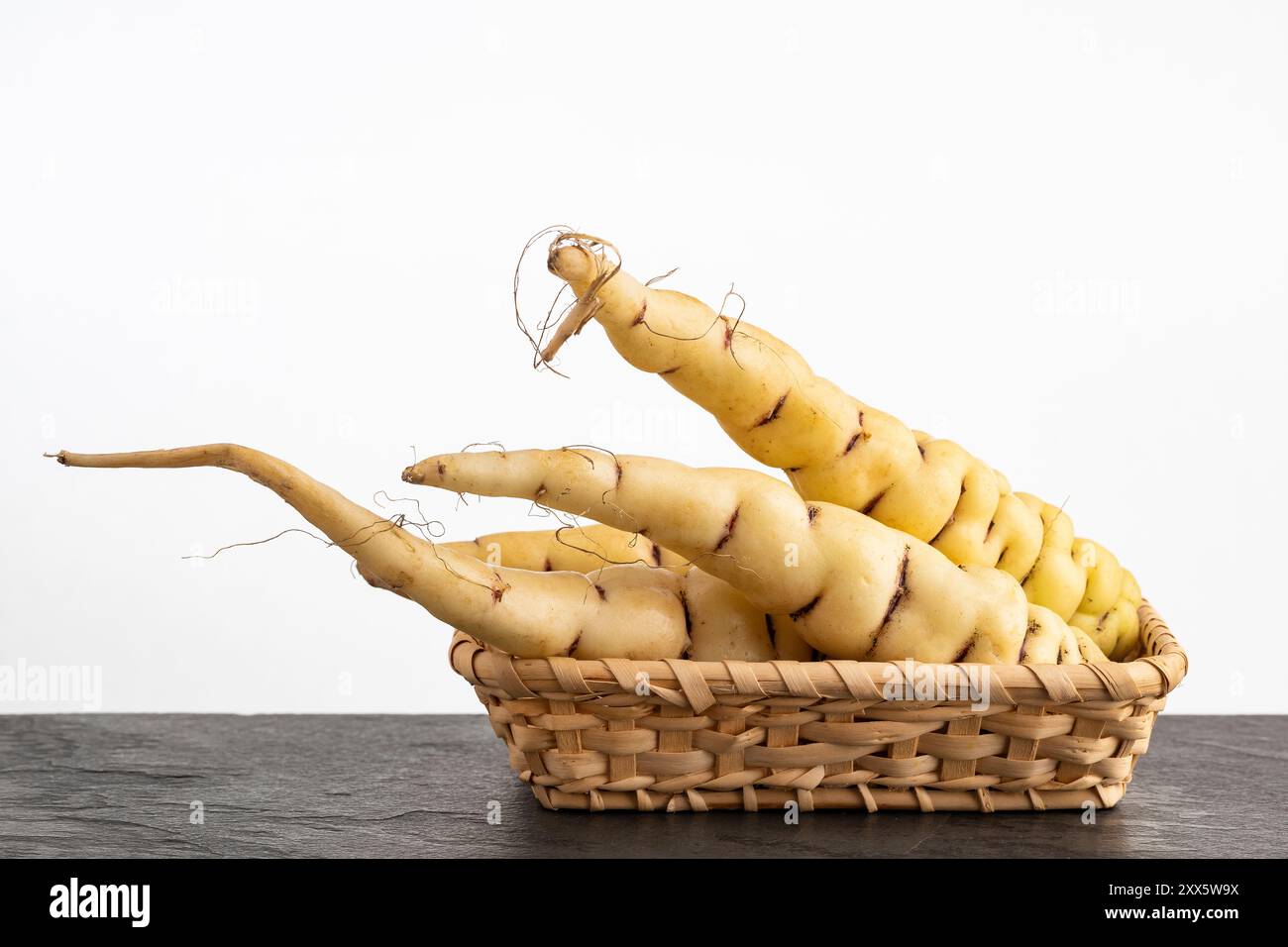 Colombian cubios on white background - Organic tubers. Tropaeolum ...