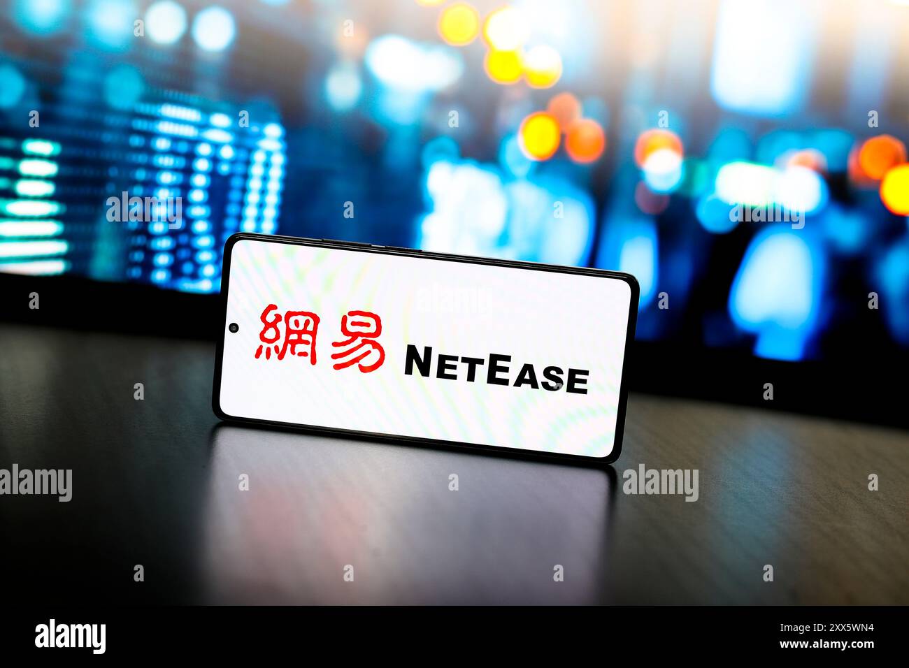 In this photo illustration, the NetEase, Inc. logo is displayed on a smartphone screen Stock ...
