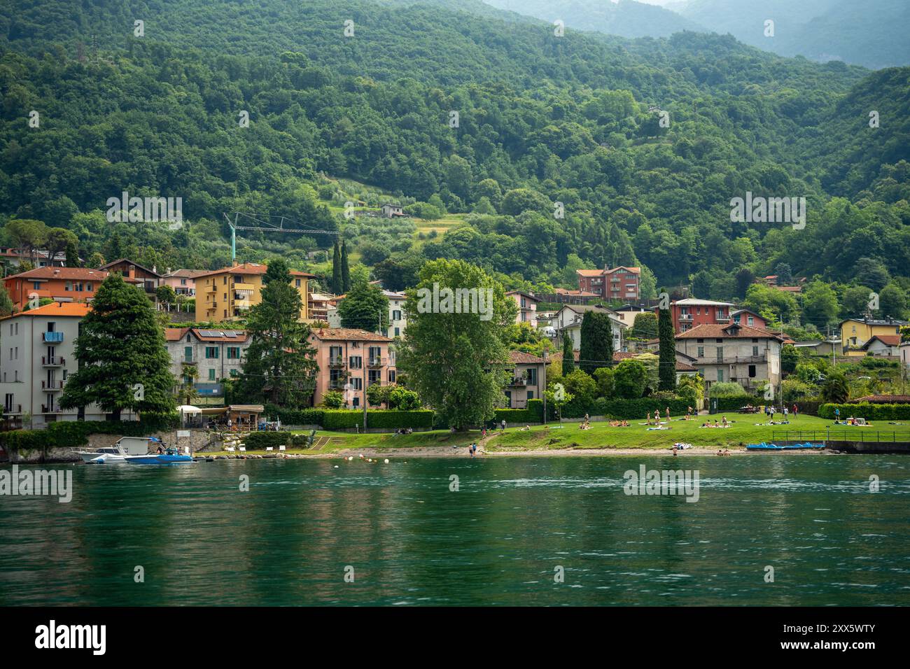 Mandello del Lario, Italy - June 08, 2024: A small beach near a small ...