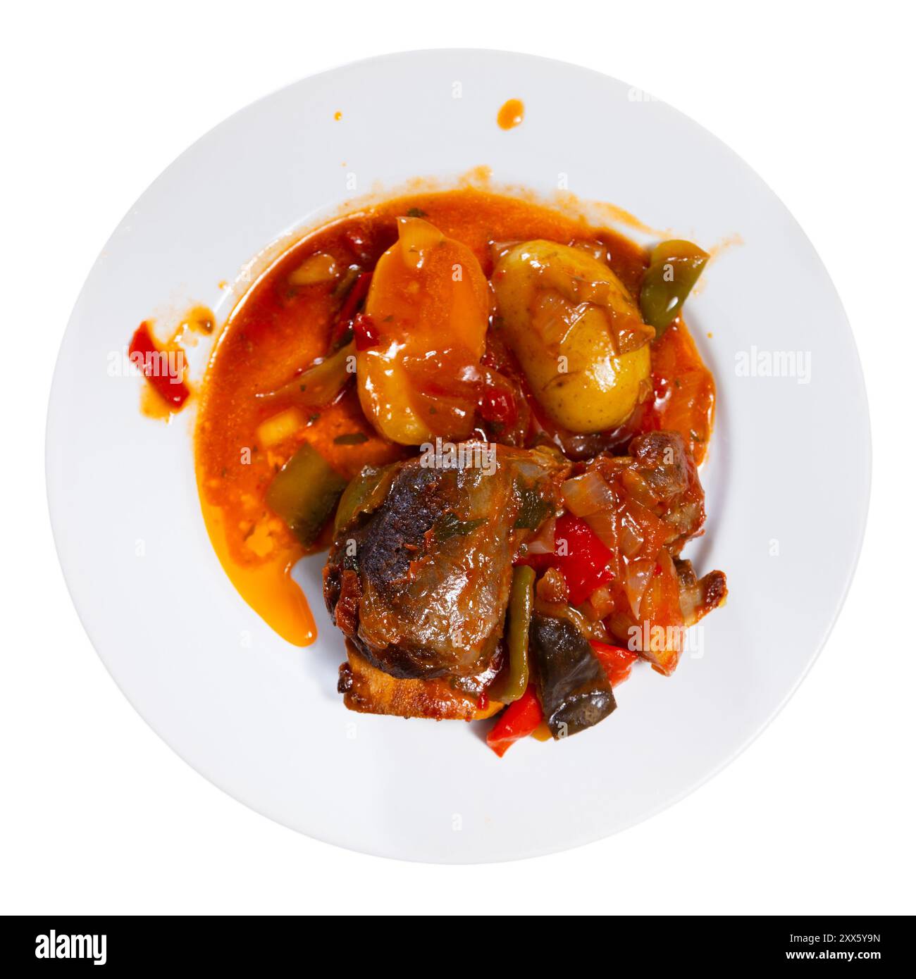 Baked pork cheek served with vegetables Stock Photo - Alamy