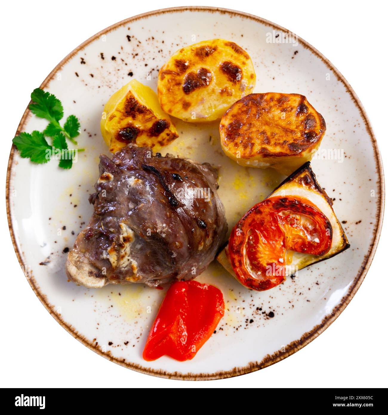 Grilled pork cheeks with roasted vegetables for dinner Stock Photo - Alamy