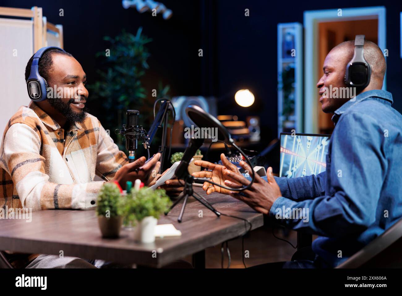 Talking creating content two hi-res stock photography and images - Alamy