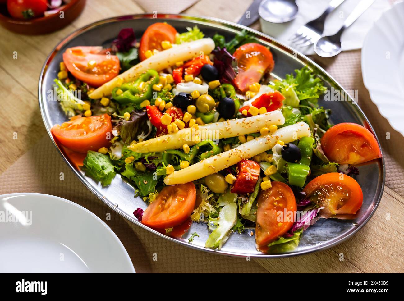 Traditional Spanish mixed salad, made from corn, tomato, lettuce ...