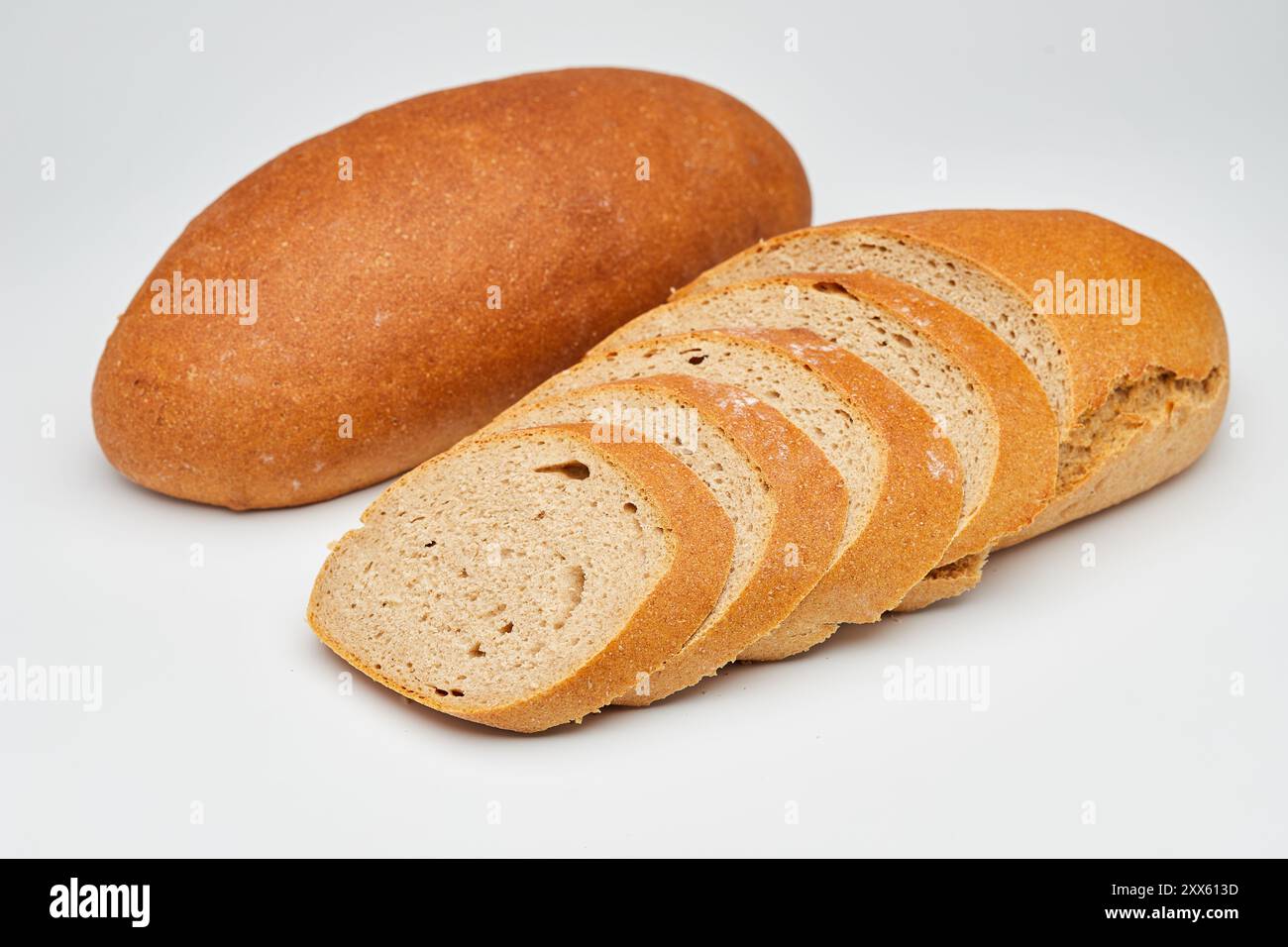 Whole wheat bread loaf sliced, showcasing its hearty texture and rich ...