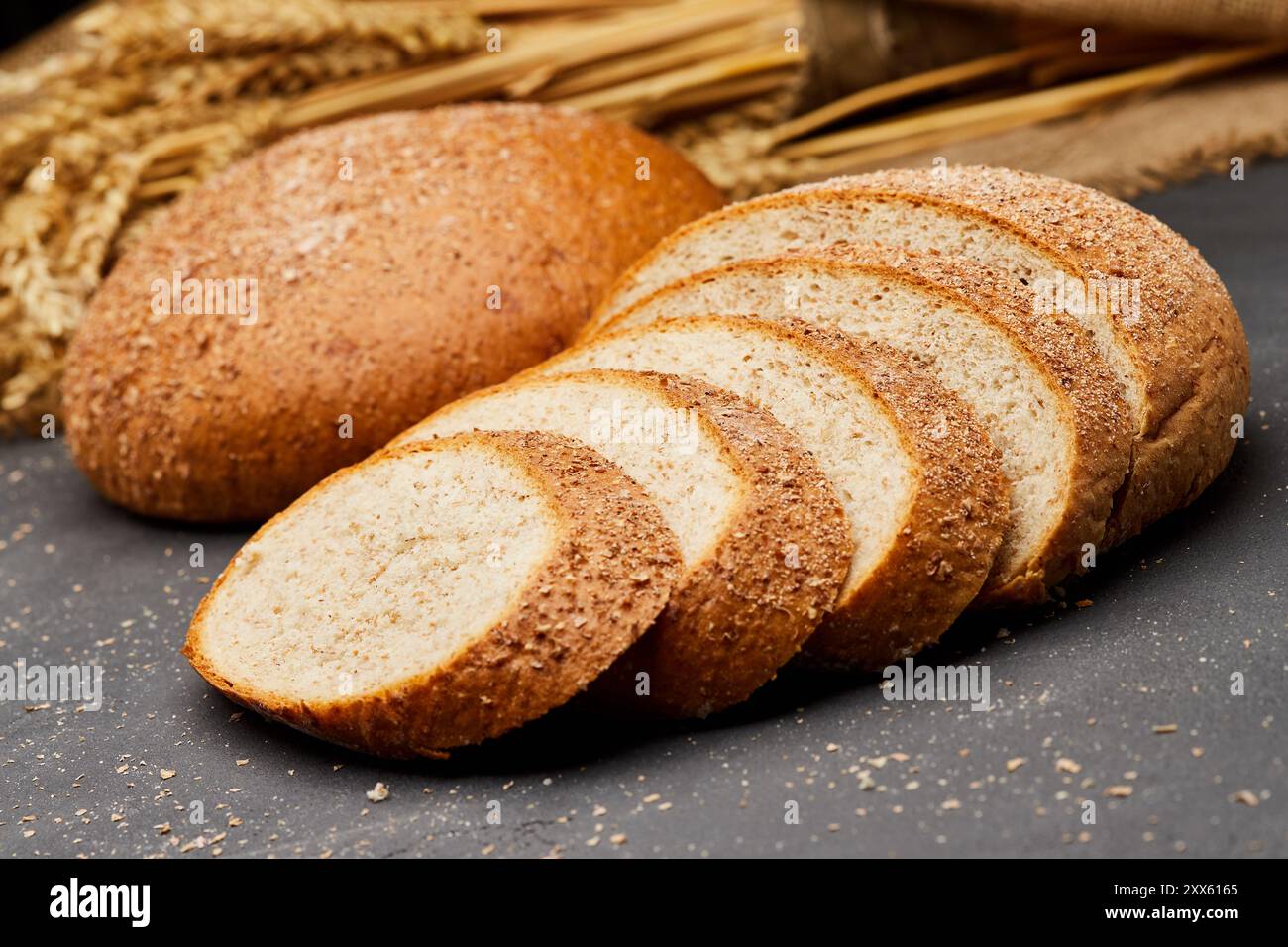 Whole wheat bread loaf sliced, showcasing its hearty texture and rich ...