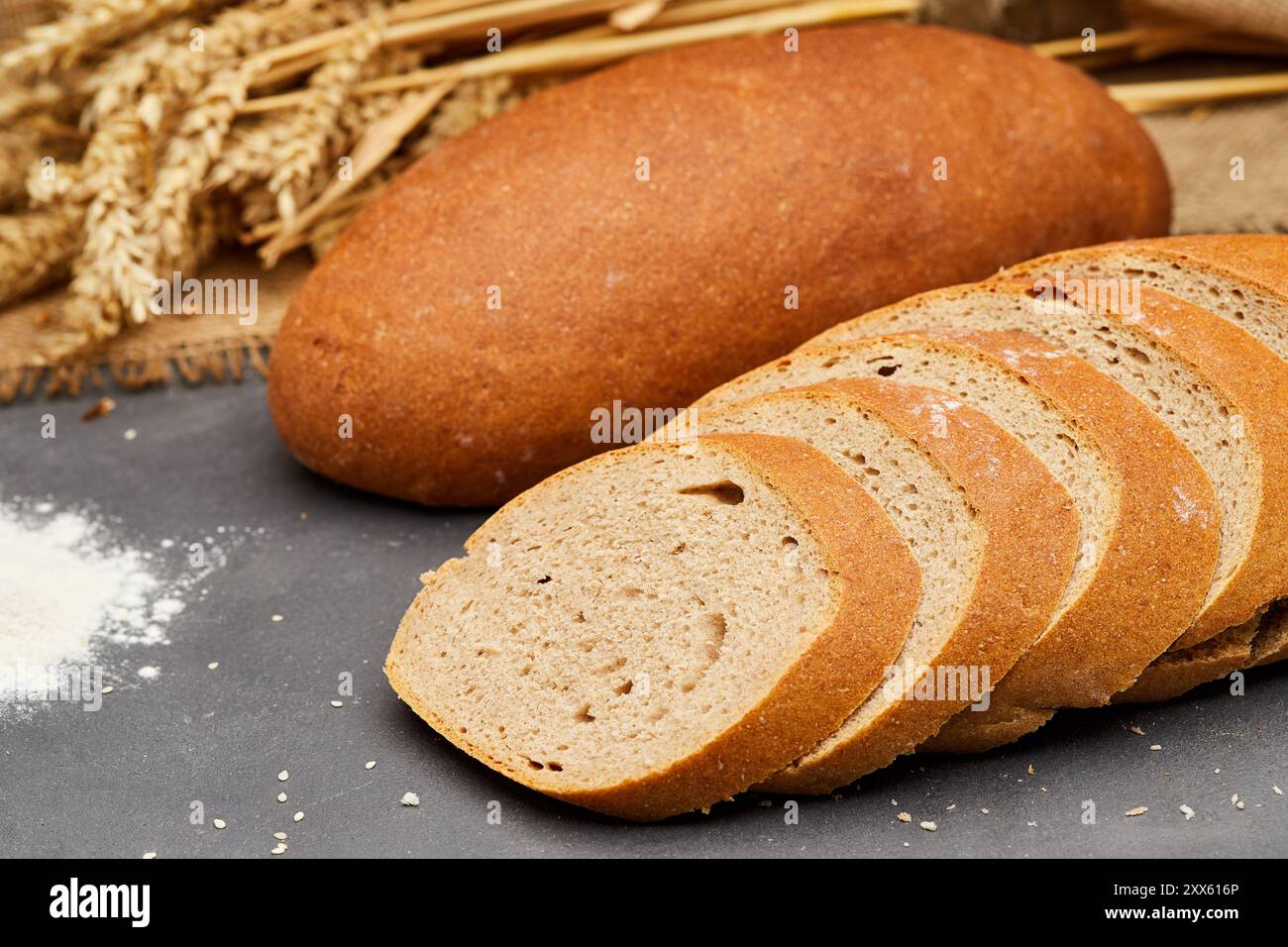 Whole wheat bread loaf sliced, showcasing its hearty texture and rich ...