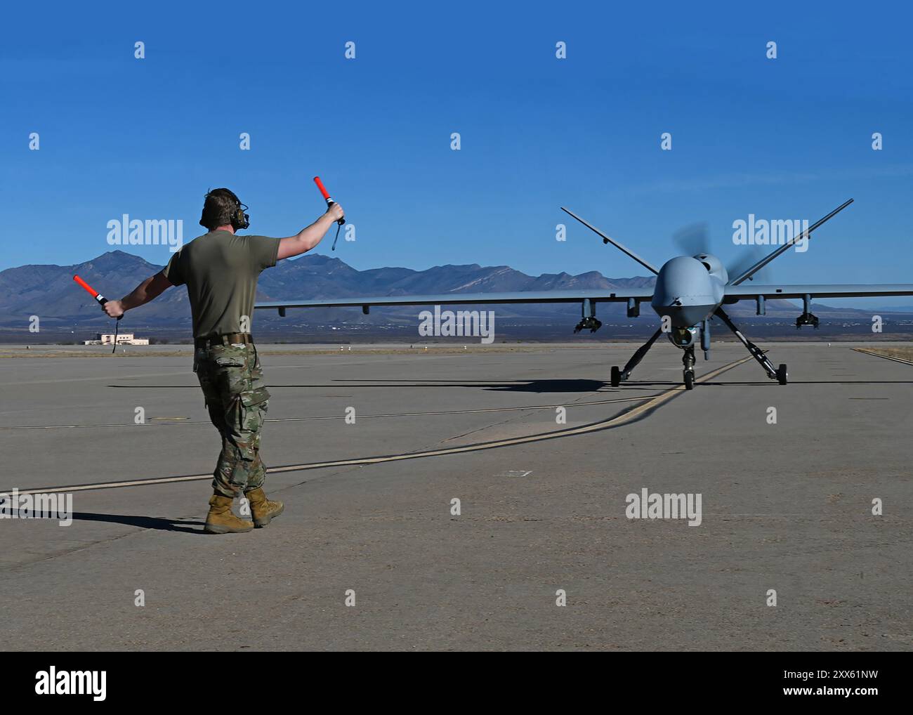 A U.S. service member assigned to Fort Huachuca, Ariz., taxis in an MQ ...