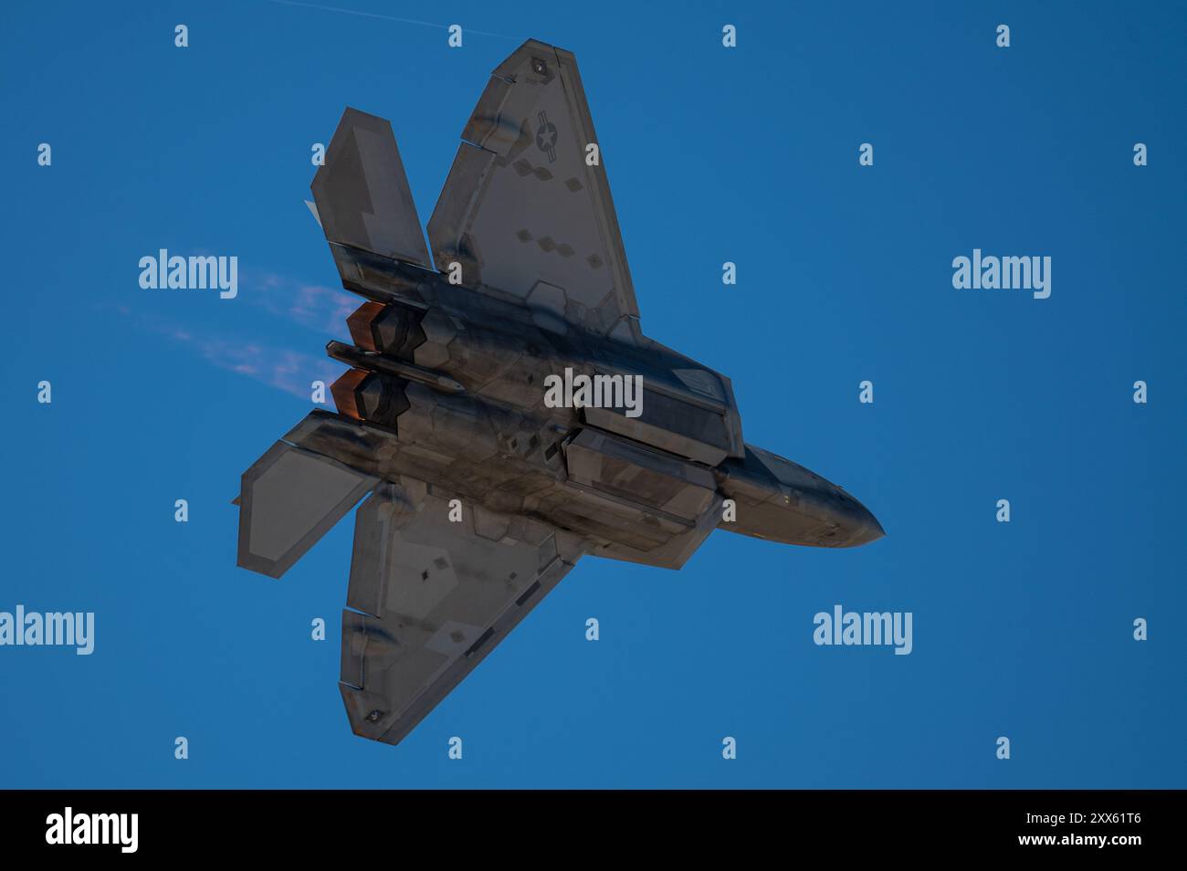 An F-22 Raptor aircraft flies during the Heritage Flight Training ...