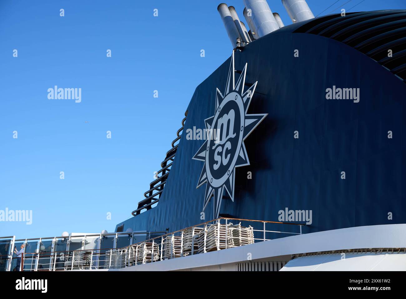 10 May 2024: The striking MSC logo on the funnel of a cruise ship. Logo ...