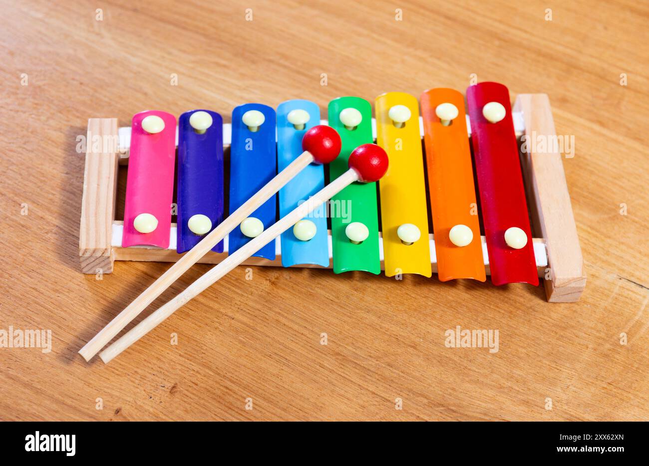 Kids xylophone with rainbow metal bars and wooden mallets Stock Photo ...