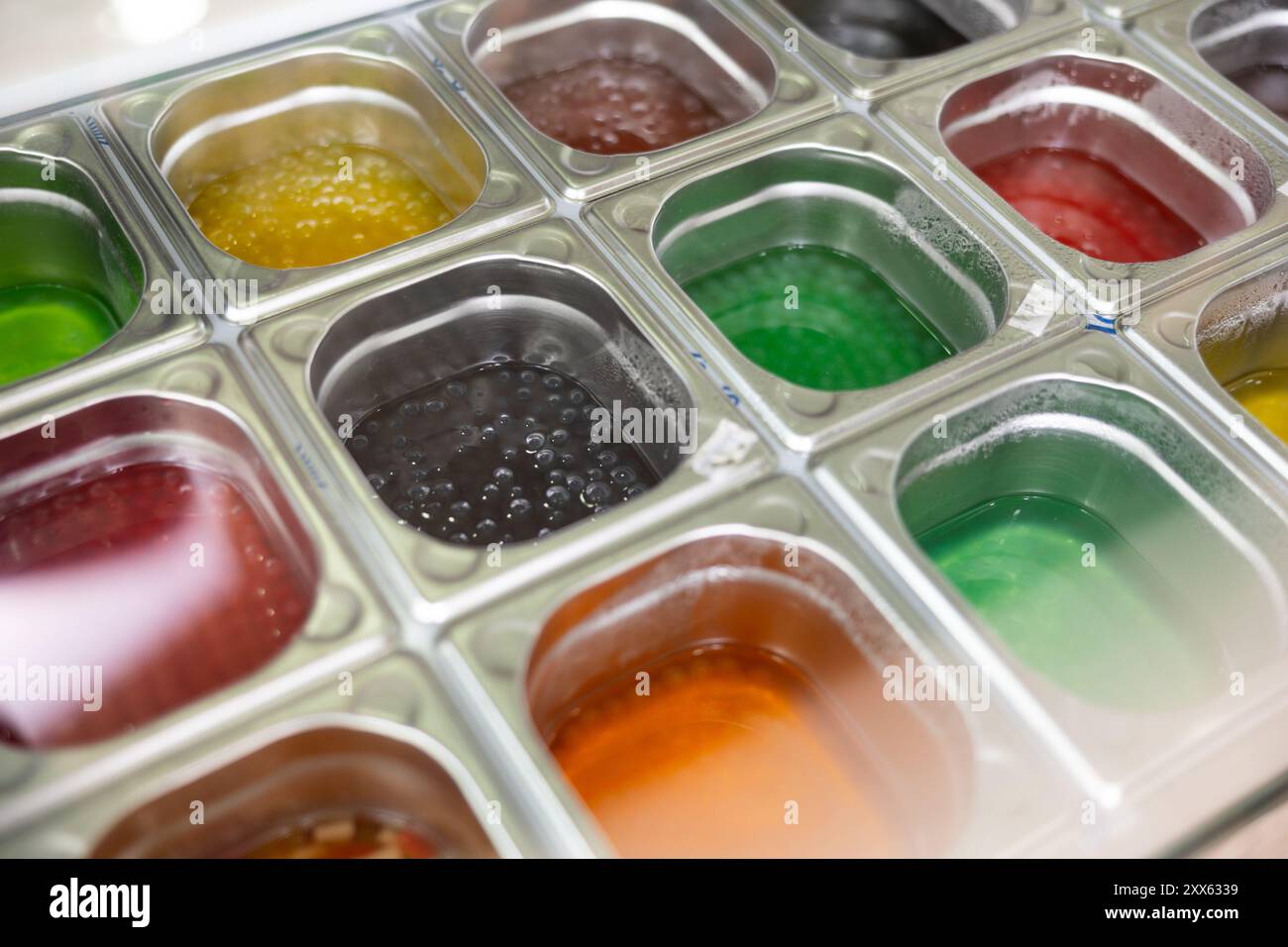 Juice balls for bubble tea in containers Stock Photo - Alamy