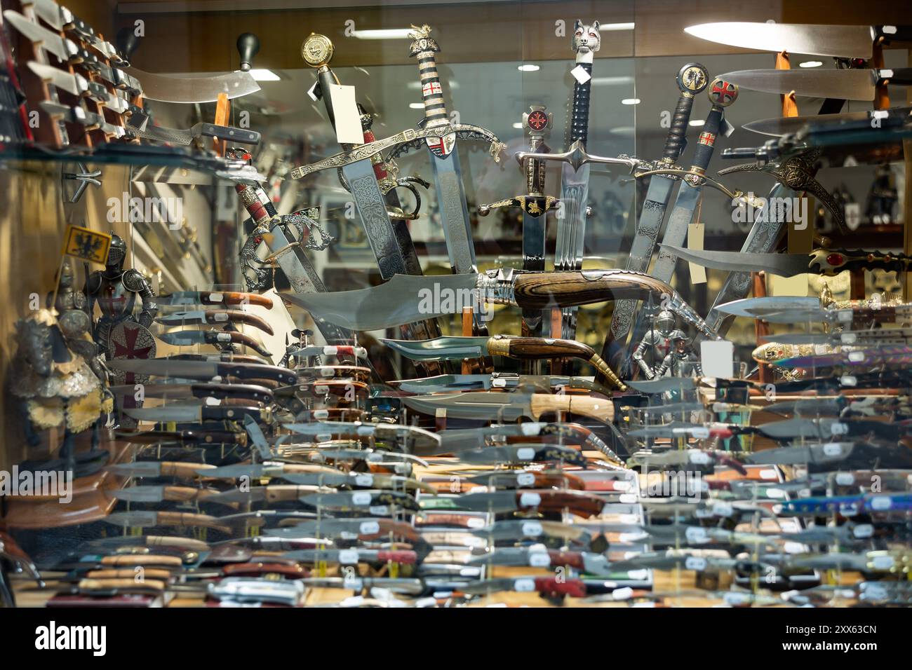 Knives and swords in showroom of souvenir shop Stock Photo - Alamy