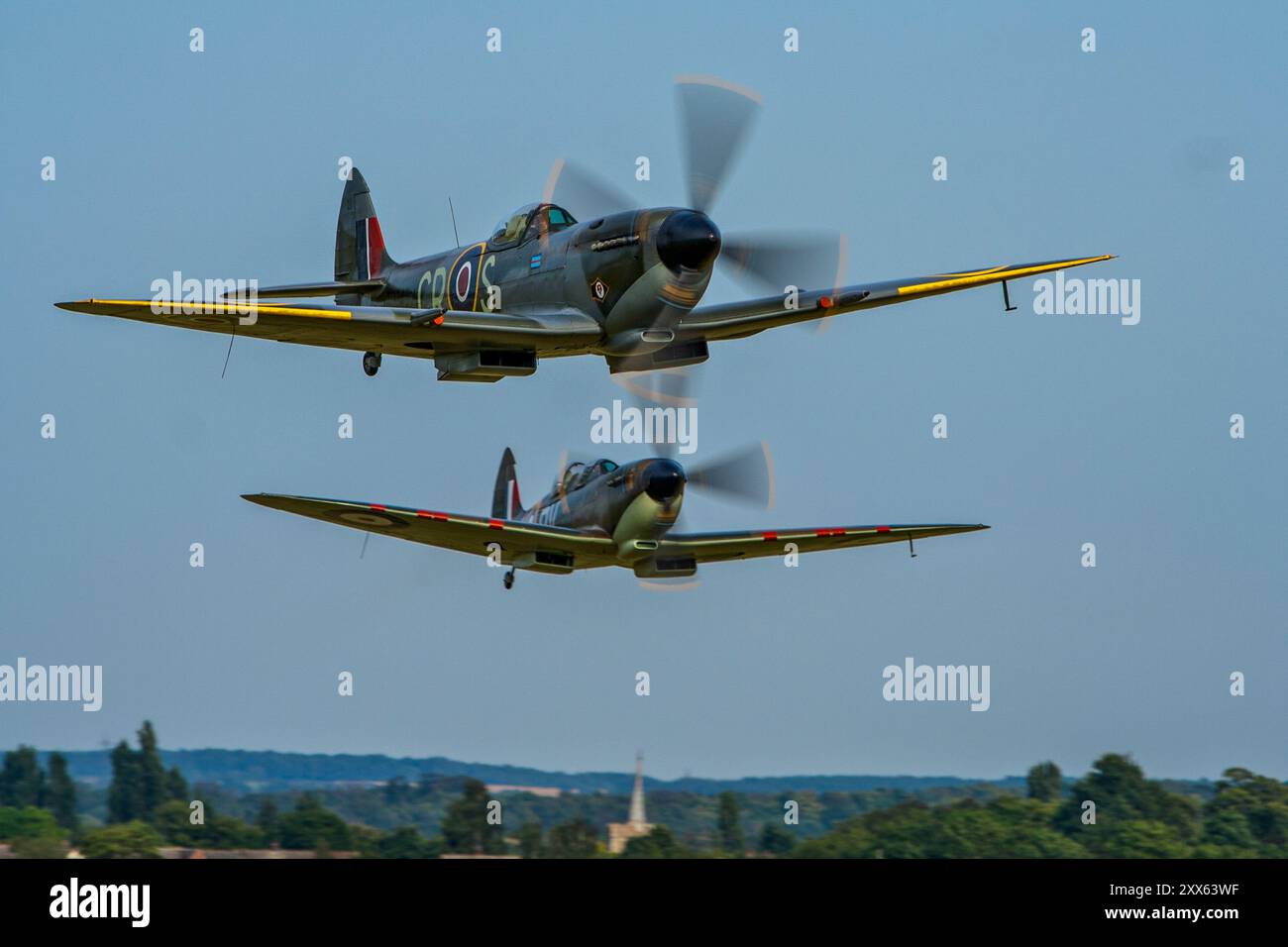 Pair of Supermarine Spitfires getting airborne at Duxford Flying ...
